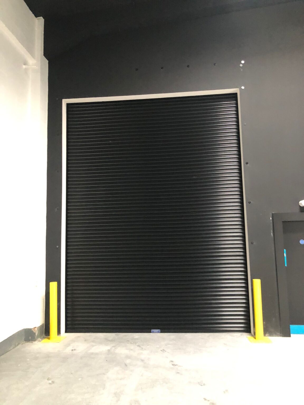 How we install safety posts for shutters - Roller Shutter Services